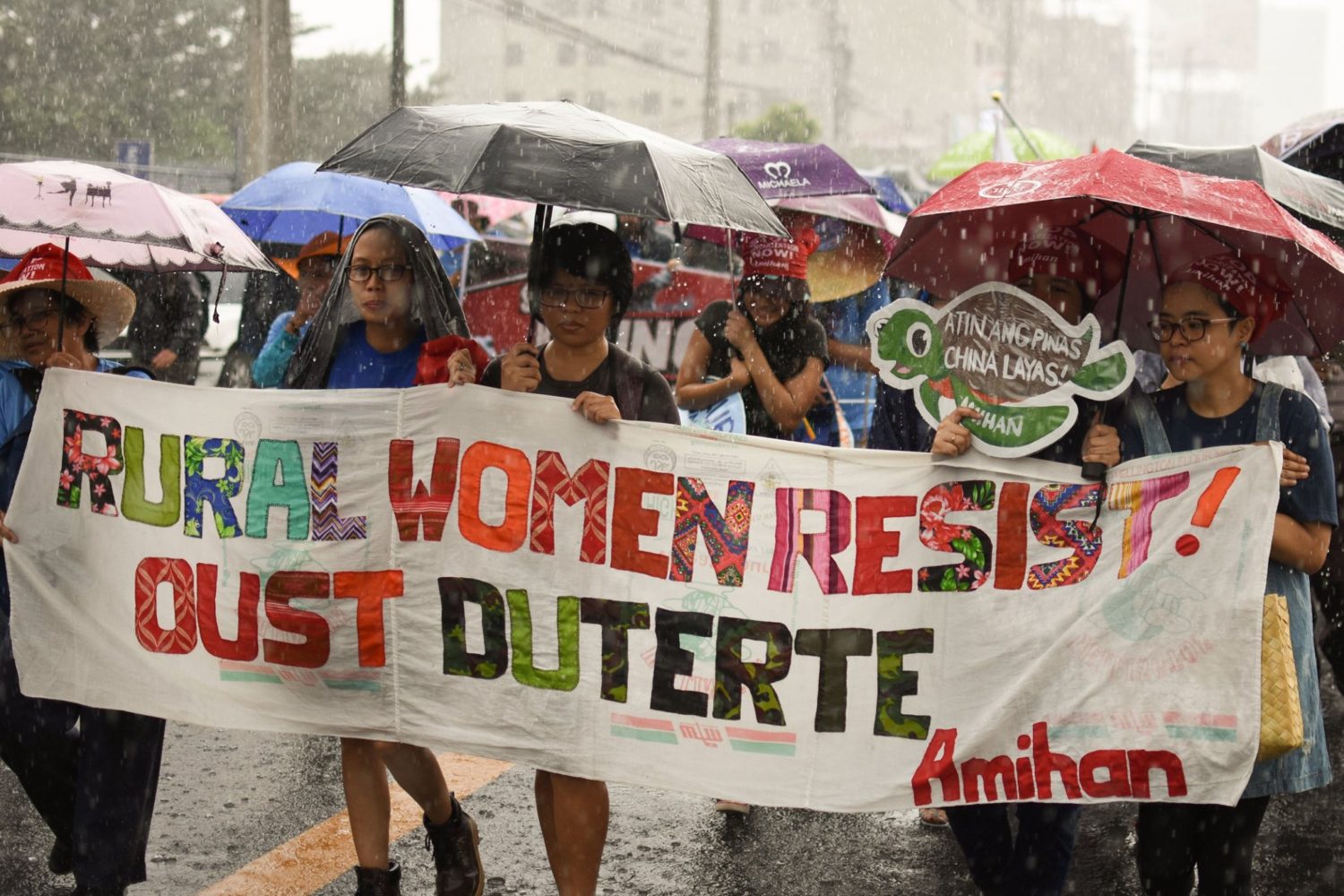 Tens of thousands brave the rain, threats from gov’t, to protest state ...